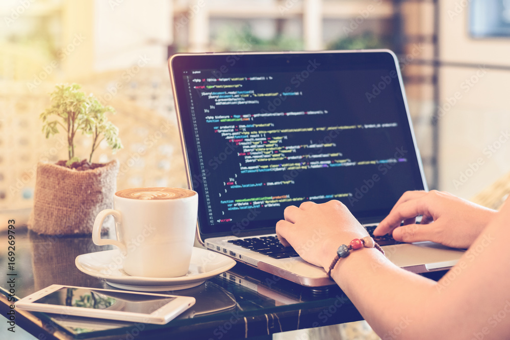 Programmer Typing New Lines of HTML Code. Laptop and Hand Closeup. Working Time. Web Design ...