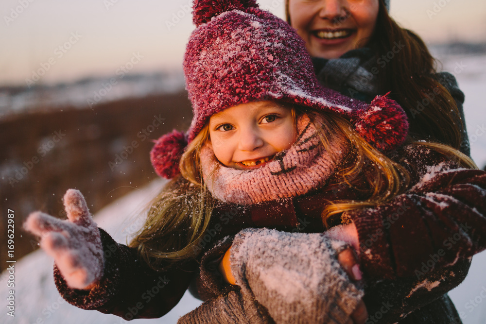 Little girl smiling into the camera Stock Photo | Adobe Stock