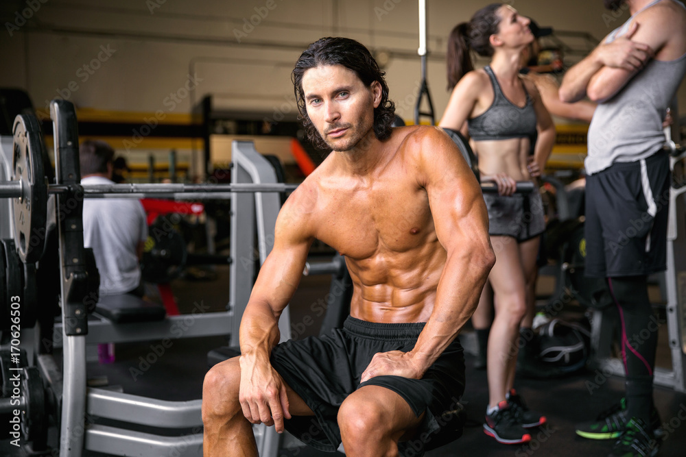 Male model with perfect muscular definition, abs, arms, biceps, chest ...