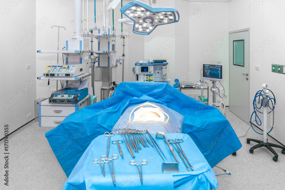 Interior view of operating room with equipment and medical devices in ...