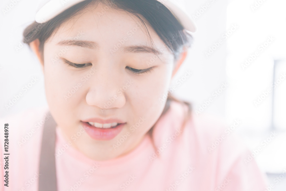 cute young innocent virgin asian teen close up face look shy with space ...
