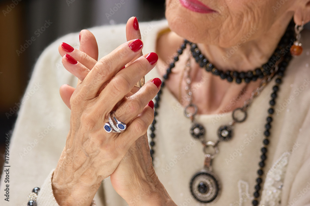 Senior woman luxury with manicure. Luxury old woman with red nails and ...