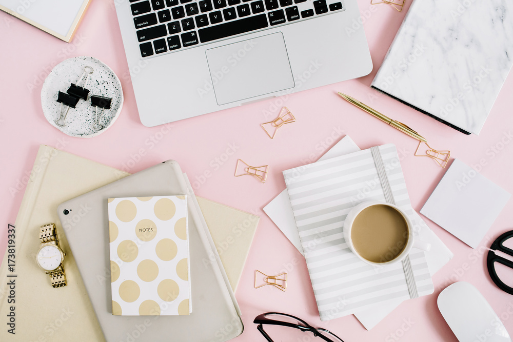 Flat lay modern workspace with laptop, notebook and stationery on ...