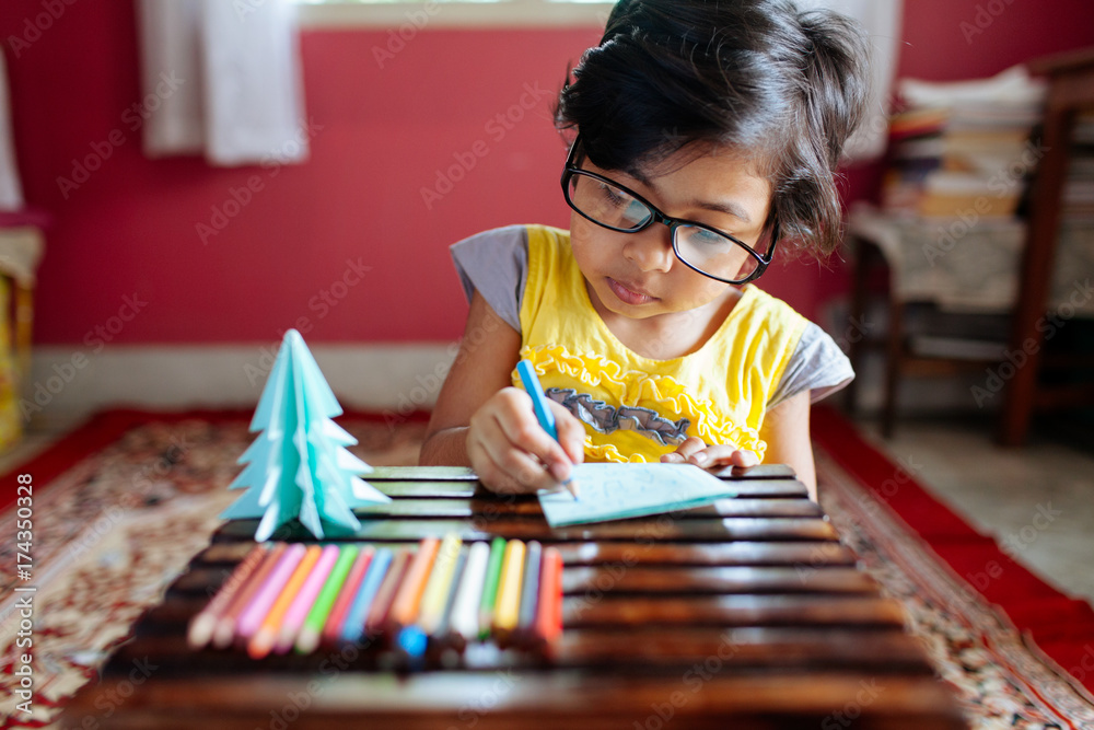 Little girl making greetings card Stock Photo | Adobe Stock