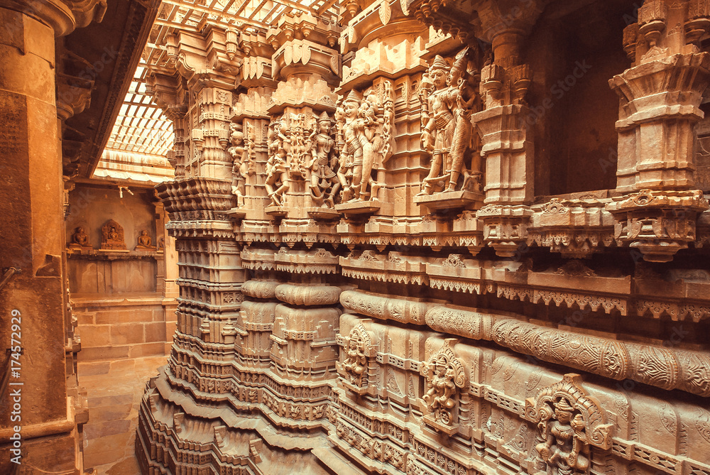 Symbolic sculptures and reliefs in Indian temple wall. Ancient ...