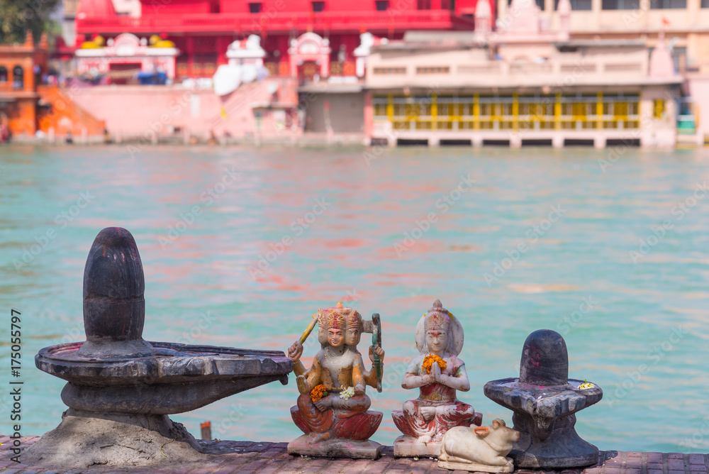Hindu religion symbols on the bank of the Ganges River, sacred waters ...