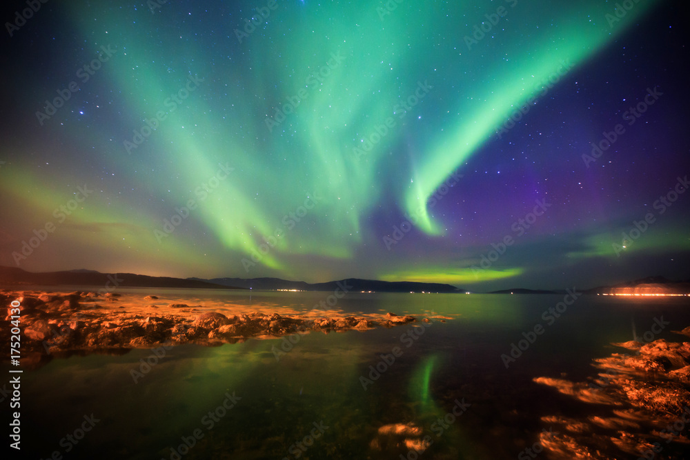 Beautiful picture of massive multicolored green vibrant Aurora Borealis ...