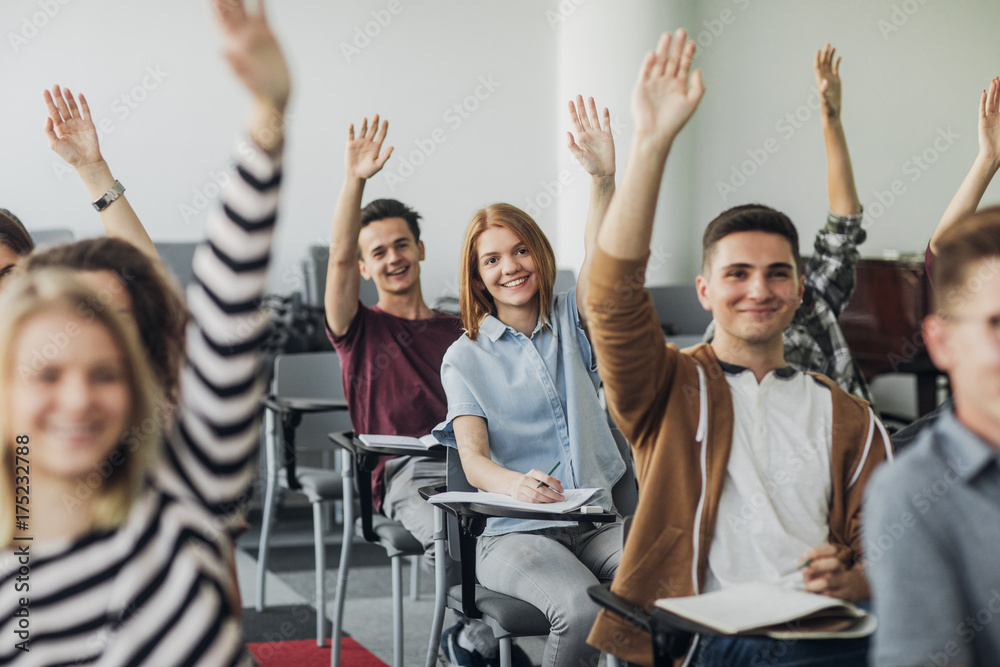 Students Rising Hands to Answer The Question Stock Photo | Adobe Stock