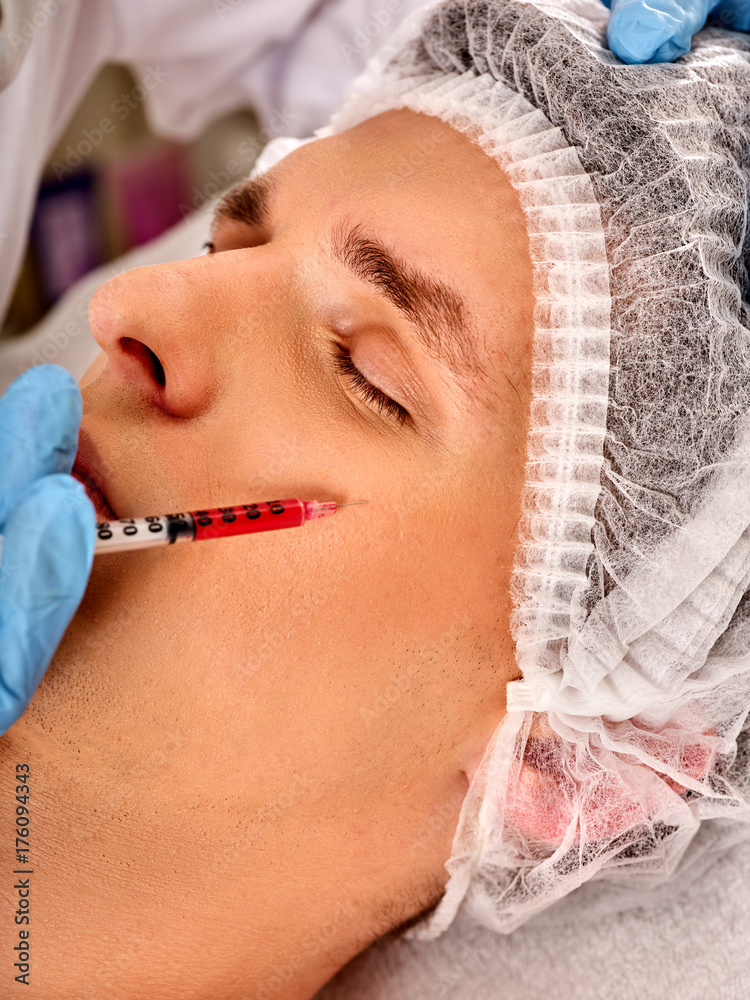 Filler injection for male forehead face. Plastic aesthetic facial ...
