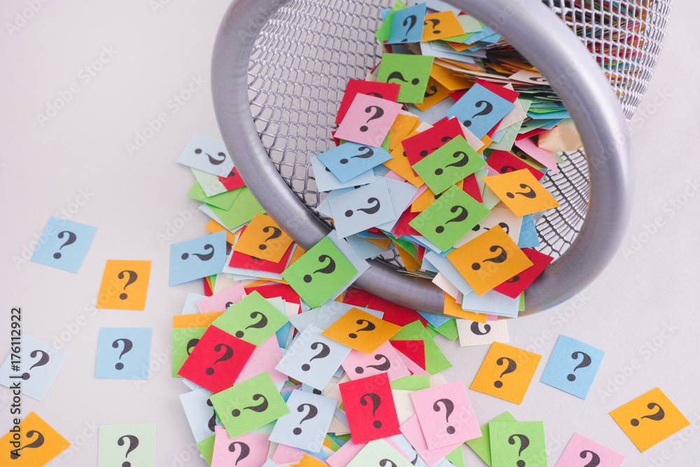 Colorful question marks falling out of trash can Stock Photo | Adobe Stock