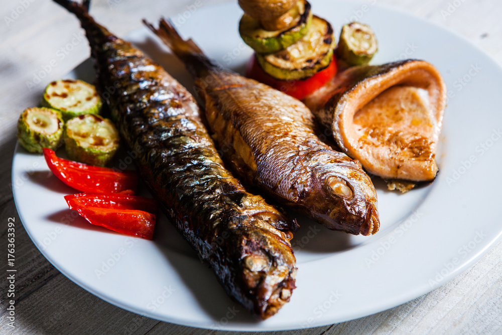 Assortment of fried fasting fish, Mackerel, trout, carp. Top view on ...
