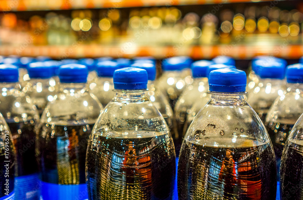Many bottles with pepsi top view. background made by big pepsi bottles ...