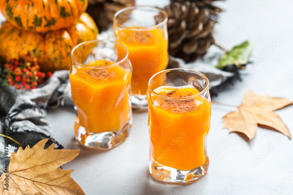 Thanksgiving autumn alcohol drink cocktail beverage with pumpkins and ...