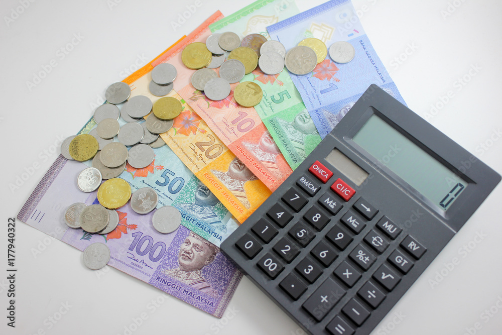 Malaysia bank note ringgit and calculator in white background Stock ...