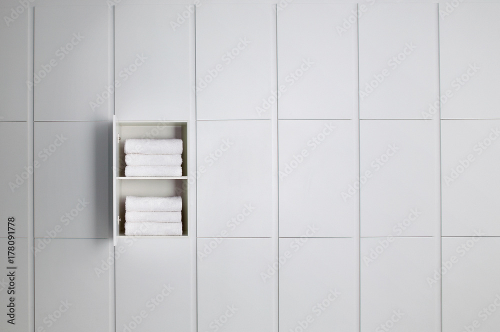 Towels in wardrobe boxes Stock Photo | Adobe Stock