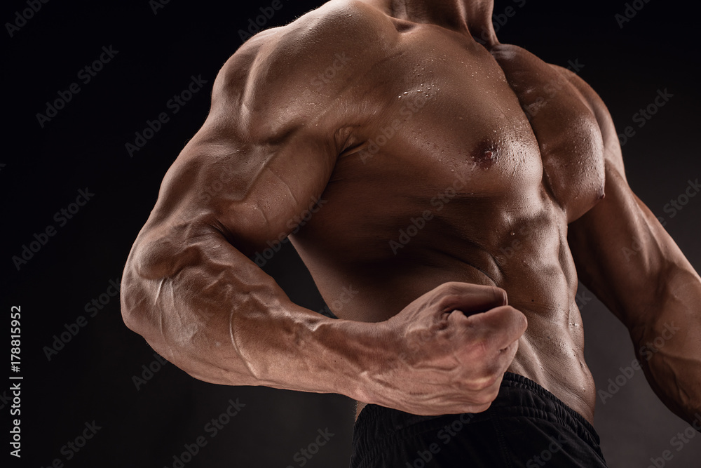 man bodybuilder showing muscular body Stock Photo | Adobe Stock