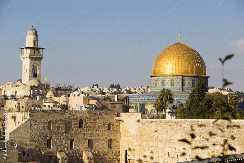 Old city quarter of ancient Jerusalem with light brown stone walls of ...