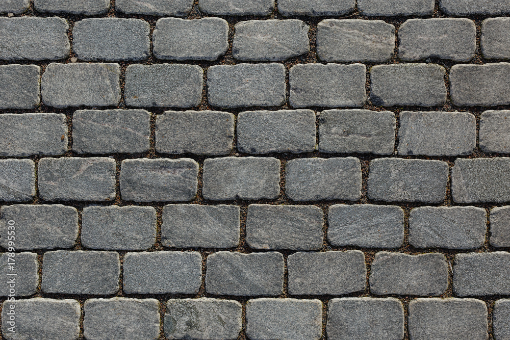 Overhead view of cobblestone street texture. Stone pavement texture ...