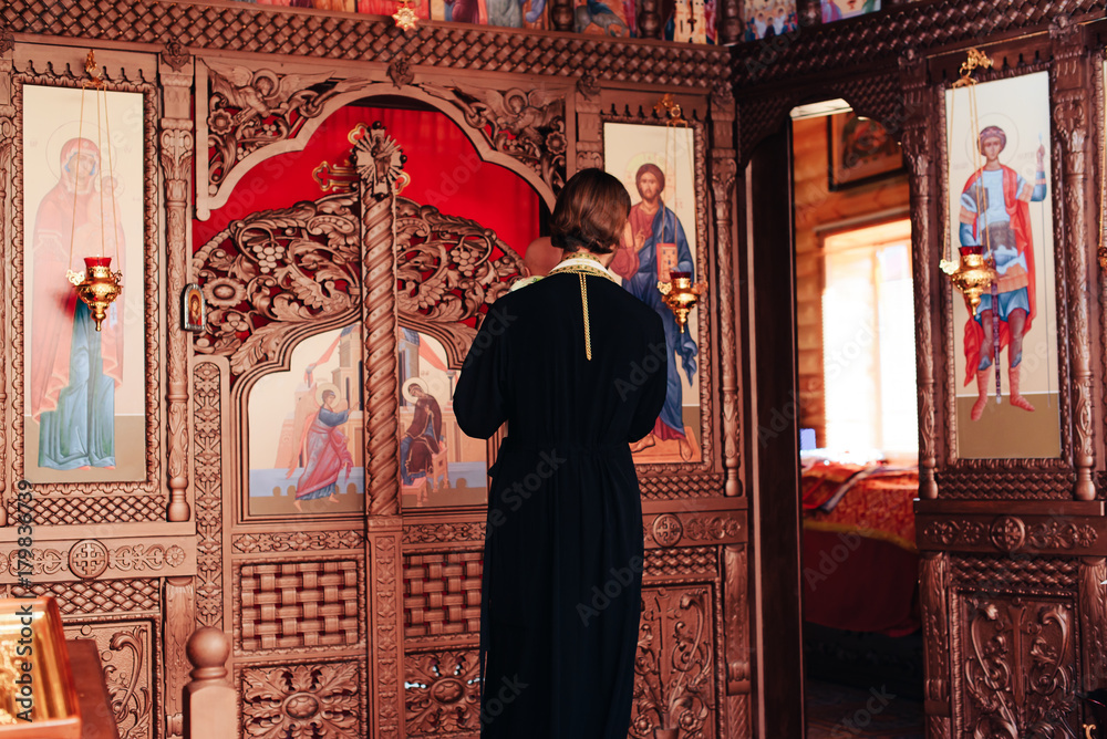 the Orthodox Church attributes, font ,icon ,cross , prayer room inside ...