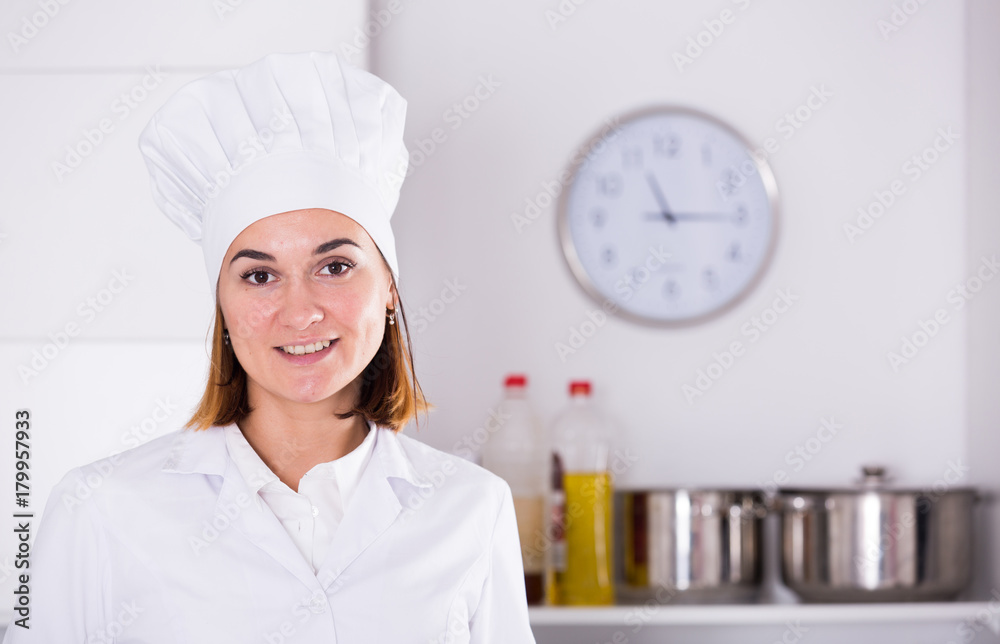 Stock-Foto „Female cook at work“ | Adobe Stock