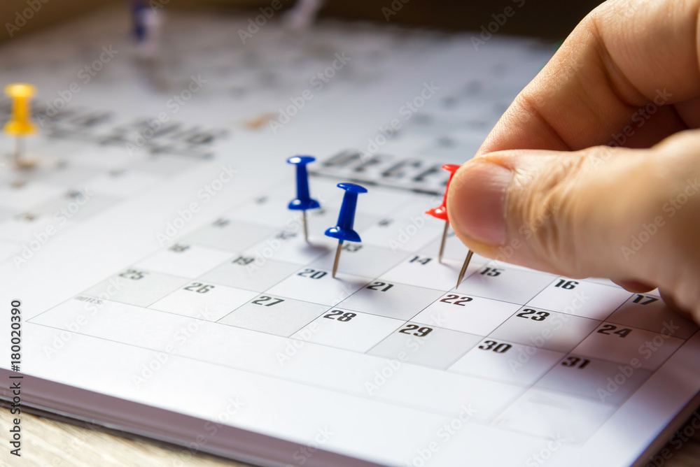 Hands are pinning notes schedule, Thumbnail in calendar for banquet ...