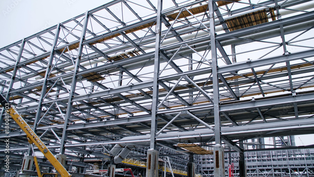 Scaffolding installation at a tank with process structures of refinery ...
