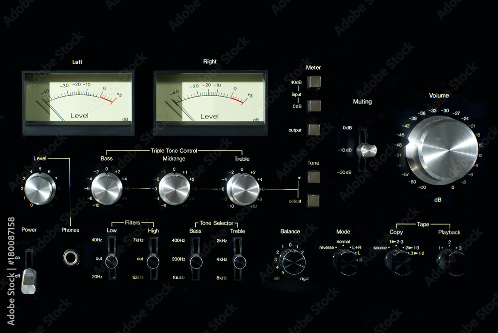 Front panel section of audio power amplifier with switches and knobs ...