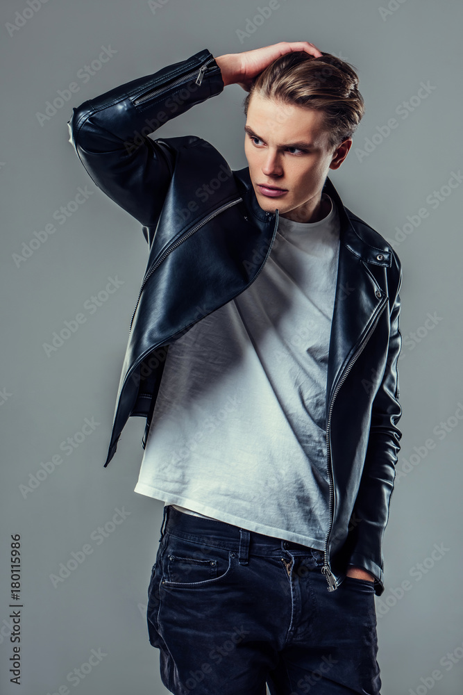 Handsome man on grey background Stock Photo | Adobe Stock