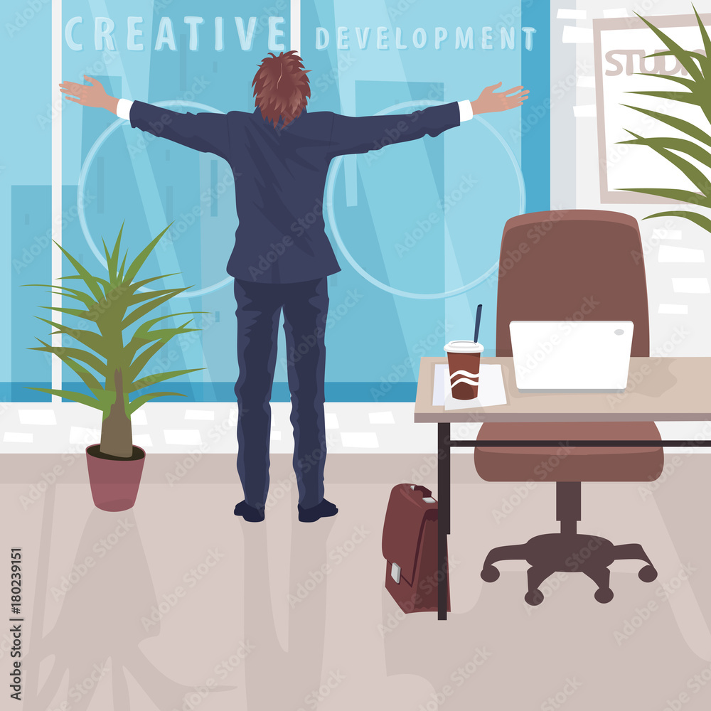 Happy employee at workplace in good office. Businessman standing near ...