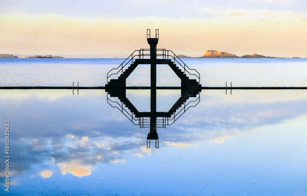 Diving board reflection on sea water swimming pool in Saint Malo ...