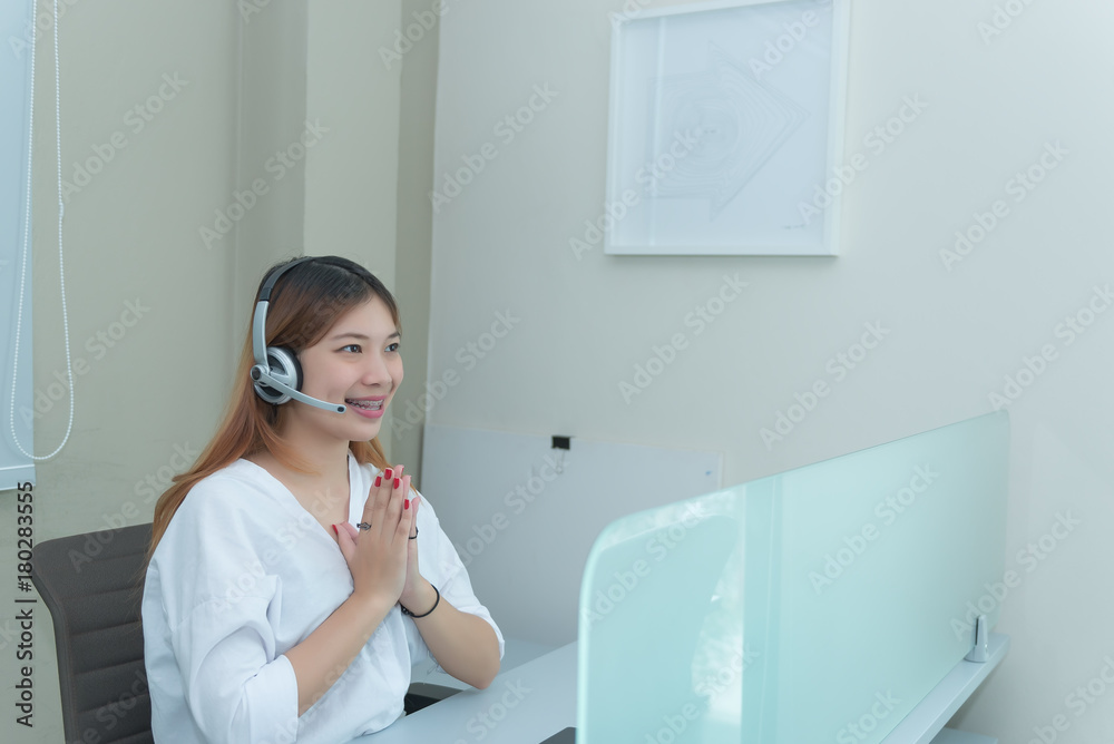 Asian beautiful woman seach profile for customers with smile at call ...