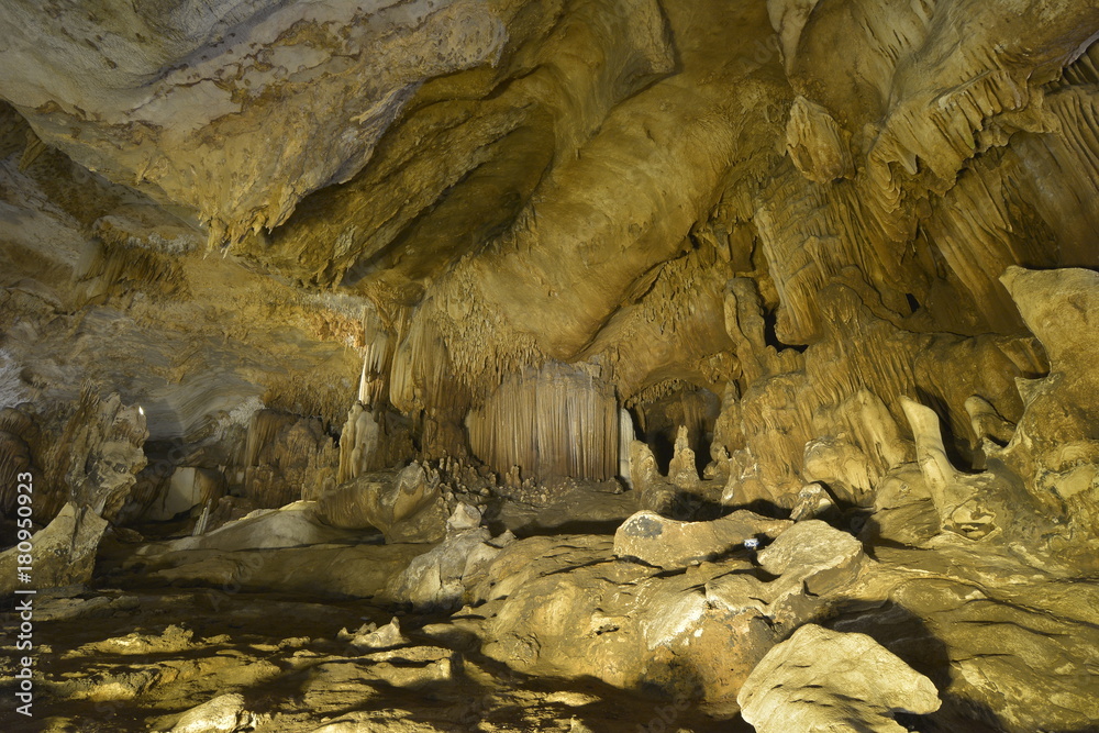 Warm Tones of Stalactites and stalagmites in cave / is a type of ...