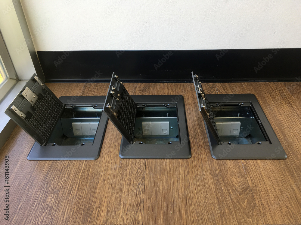 Floor plug,pop up plug in metal cover installed in wooden floor ...