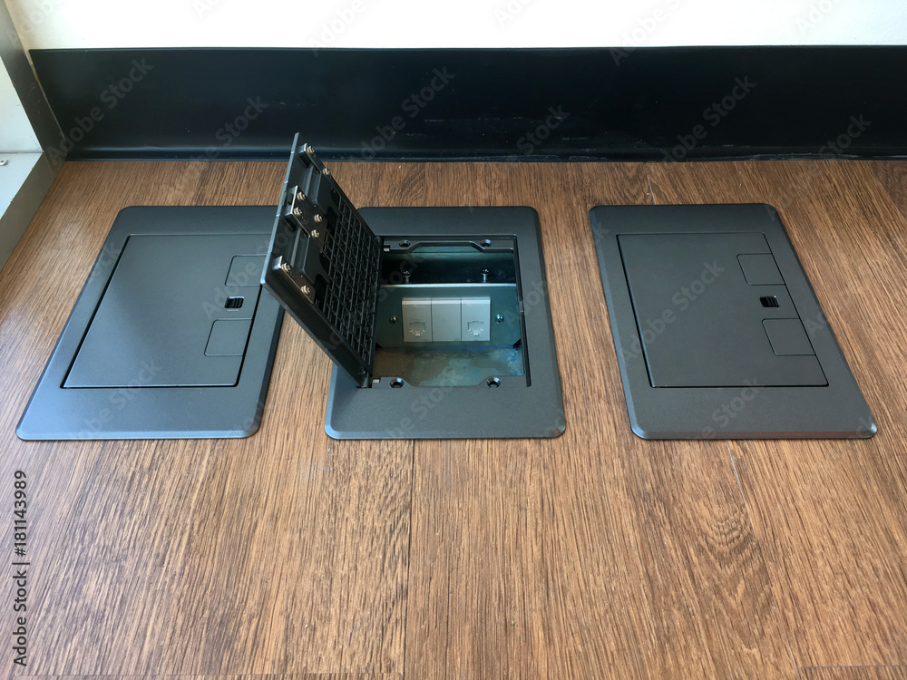 Floor plug,pop up plug in metal cover installed in wooden floor ...