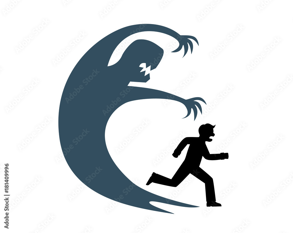 The silhouette of a man runs away from his huge shadow which symbolizes ...