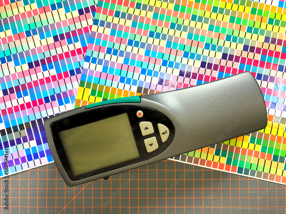 Spectrophotometer Color chart with measurement tool. Checking colors ...