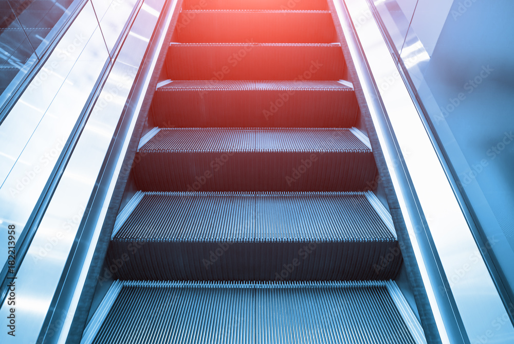 Empty escalator or moving stair. Also called stairway or staircase ...