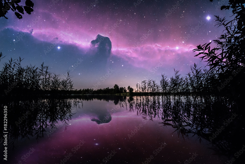 Stars over the lake at summer night on dark sky. Starfall. Amazing ...