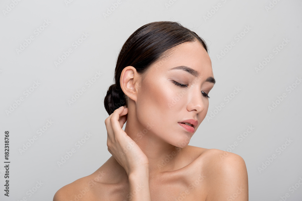 Natural beauty. Gorgeous cute sensual asian girl. She is posing without ...