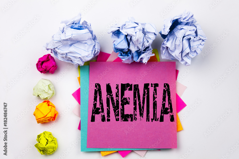 Writing text showing Anemia written on sticky note in office with screw ...