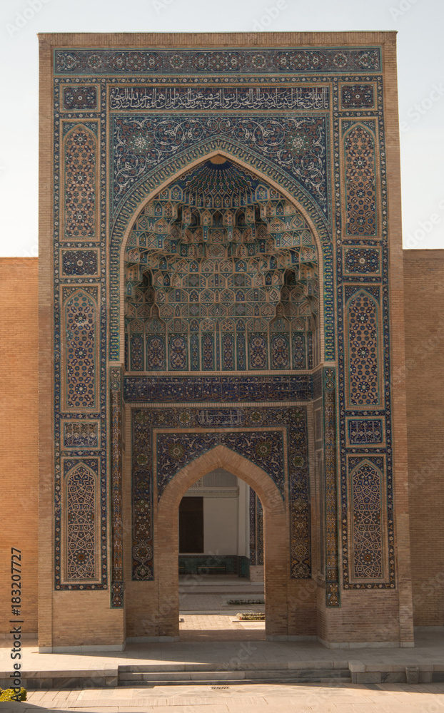 Central Asian ancient arch, the entrance to the mausoleum of Amir Timur ...
