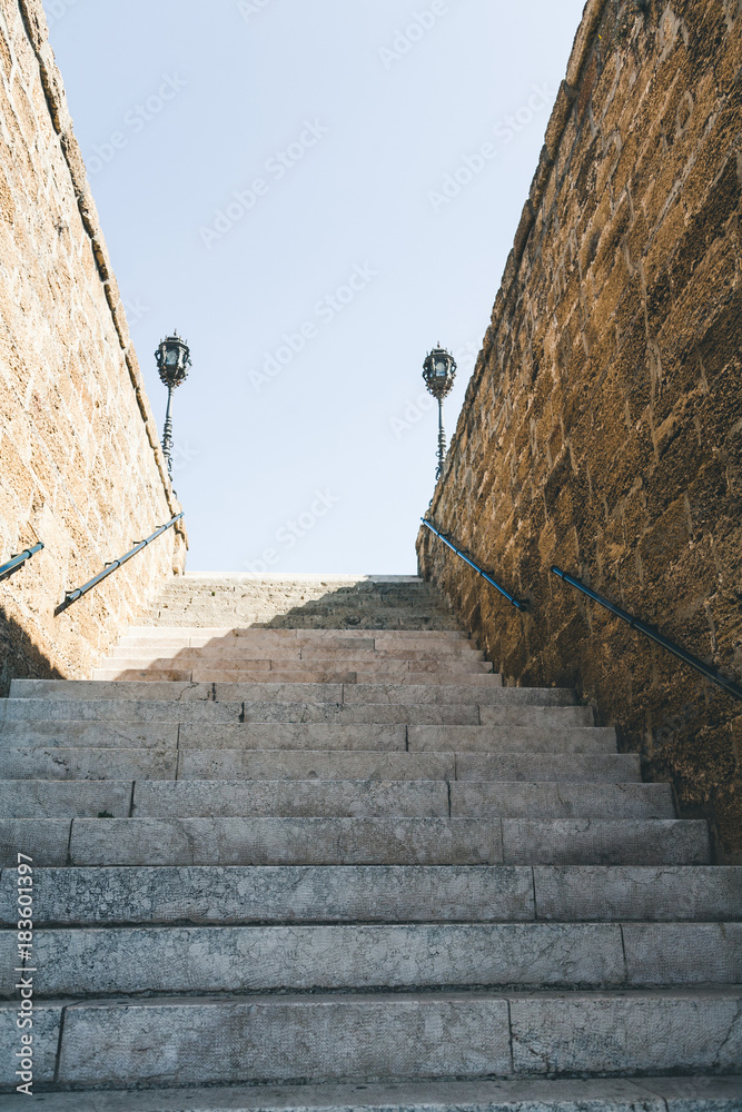 bottom view of stairs with walls and railings Stock Photo | Adobe Stock
