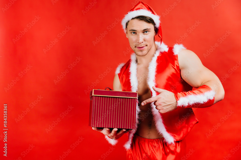 Holidays celebrations, New year, Christmas. Sexy fitness Santa Claus in ...