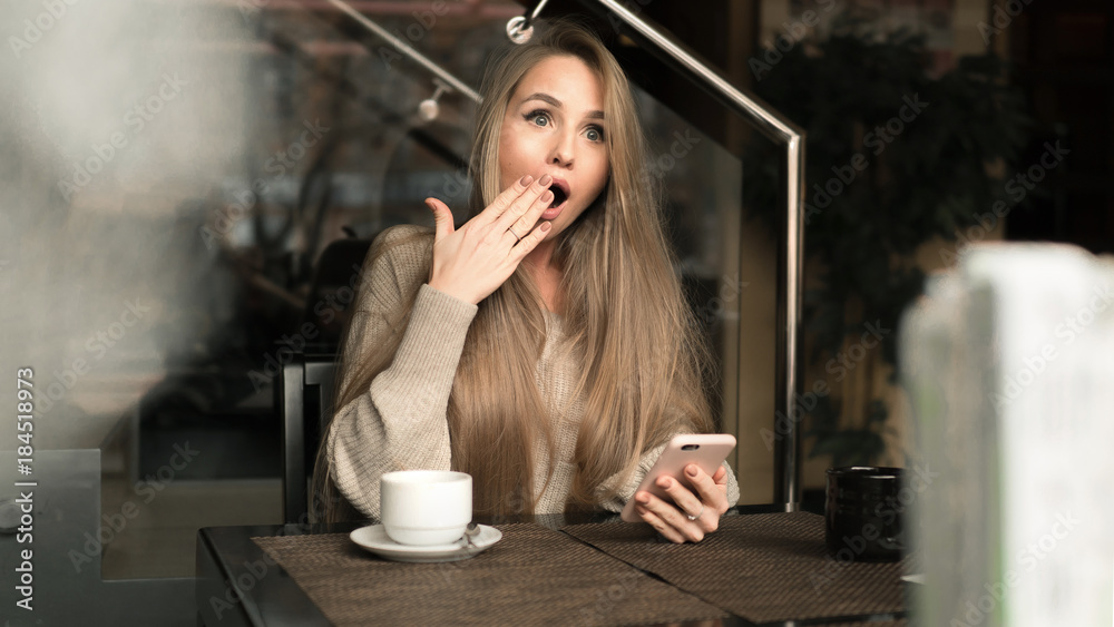 SMS. Closeup portrait funny shocked anxious scared young girl looking ... SMS. Closeup portrait funny shocked anxious scared young girl looking ...