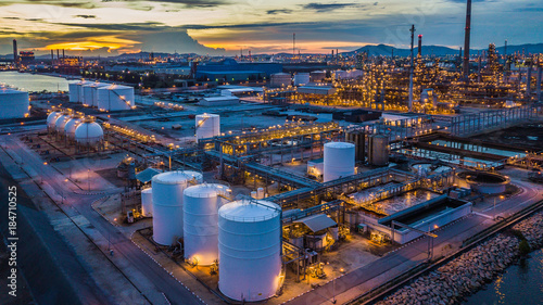Aerial view oil terminal is industrial facility at night for storage of ...