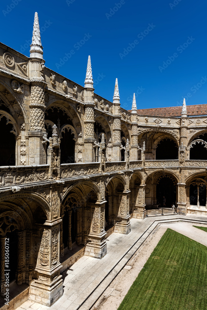 Two-storey cloisters of the Jeronimos Monastery. The monastery is one ...