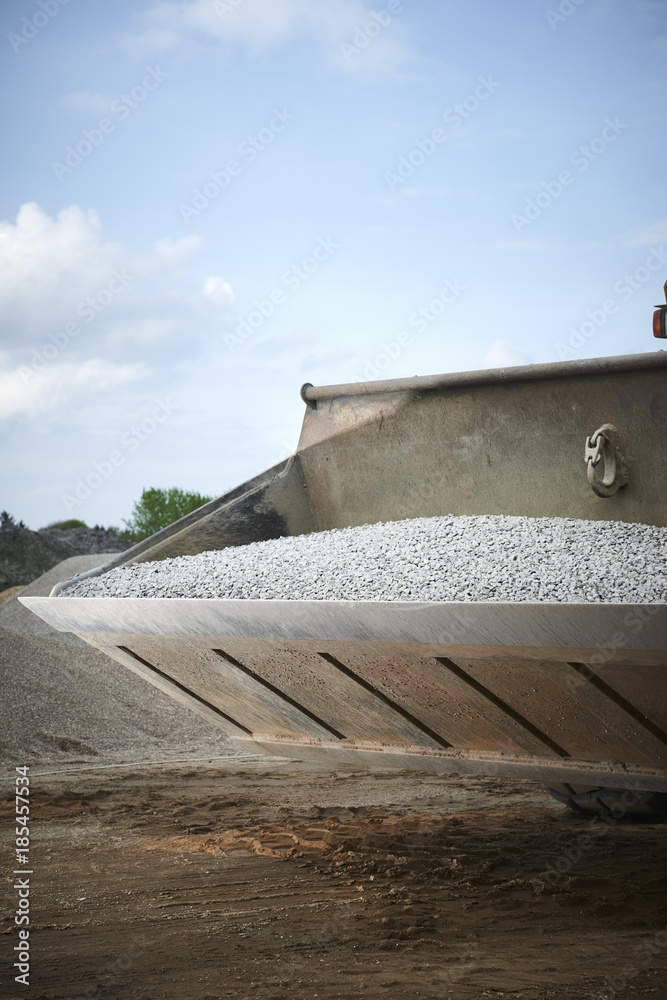Excavator moving sand Stock Photo | Adobe Stock