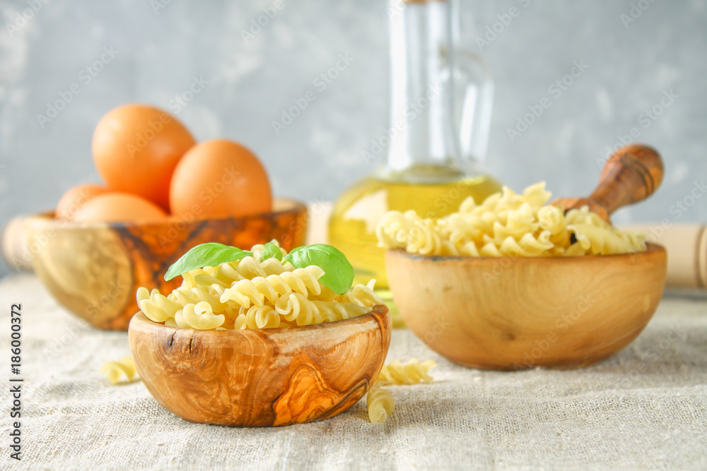Helix- or corkscrew-shaped pasta. Rotini macaroni. Related to fusilli ...