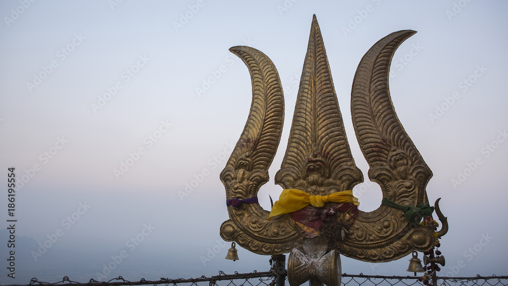 Trishul – the symbol of Lord Shiva closeup. Stock Photo | Adobe Stock