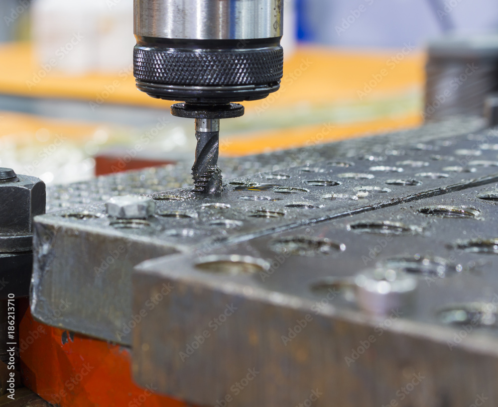 Tapping tool in spindle ; for machining process ; engineering steel ...